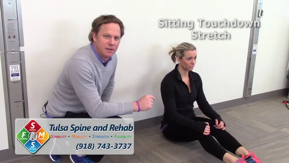 Fit Tips: Sitting Touchdown Stretch - Tulsa Spine and Rehab