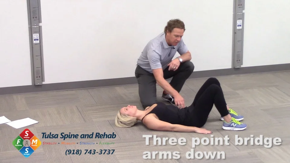 Fit Tips: Three point bridge arms down - Tulsa Spine and Rehab
